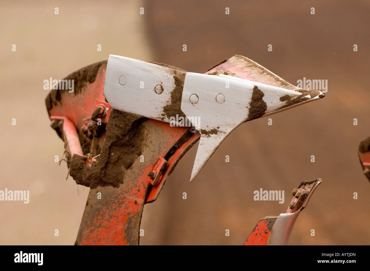 Close up of plough share with fresh soil on tip Cumbria Stock Photo - Alamy