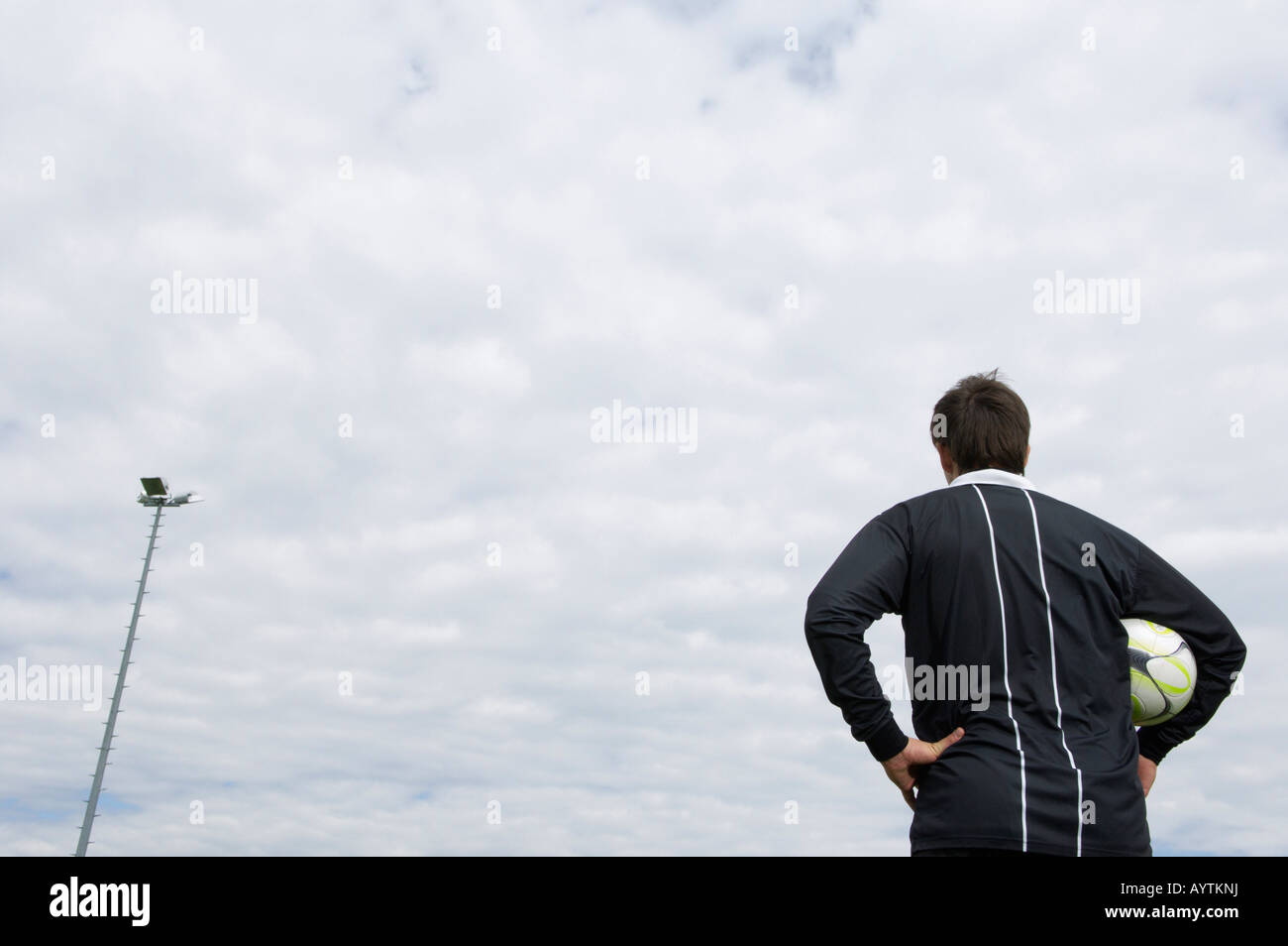 Referee with ball hi-res stock photography and images - Alamy