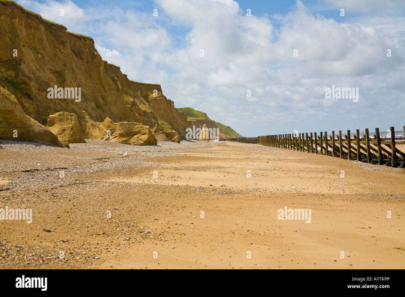 Cromer beach Norfolk England with cliffs and sea defences showing sand ...