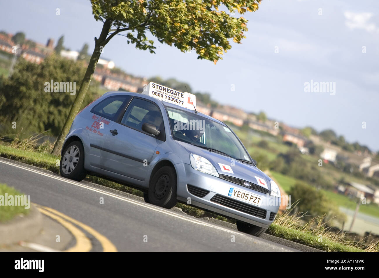 Silver ford fiesta learner driver Stock Photo - Alamy