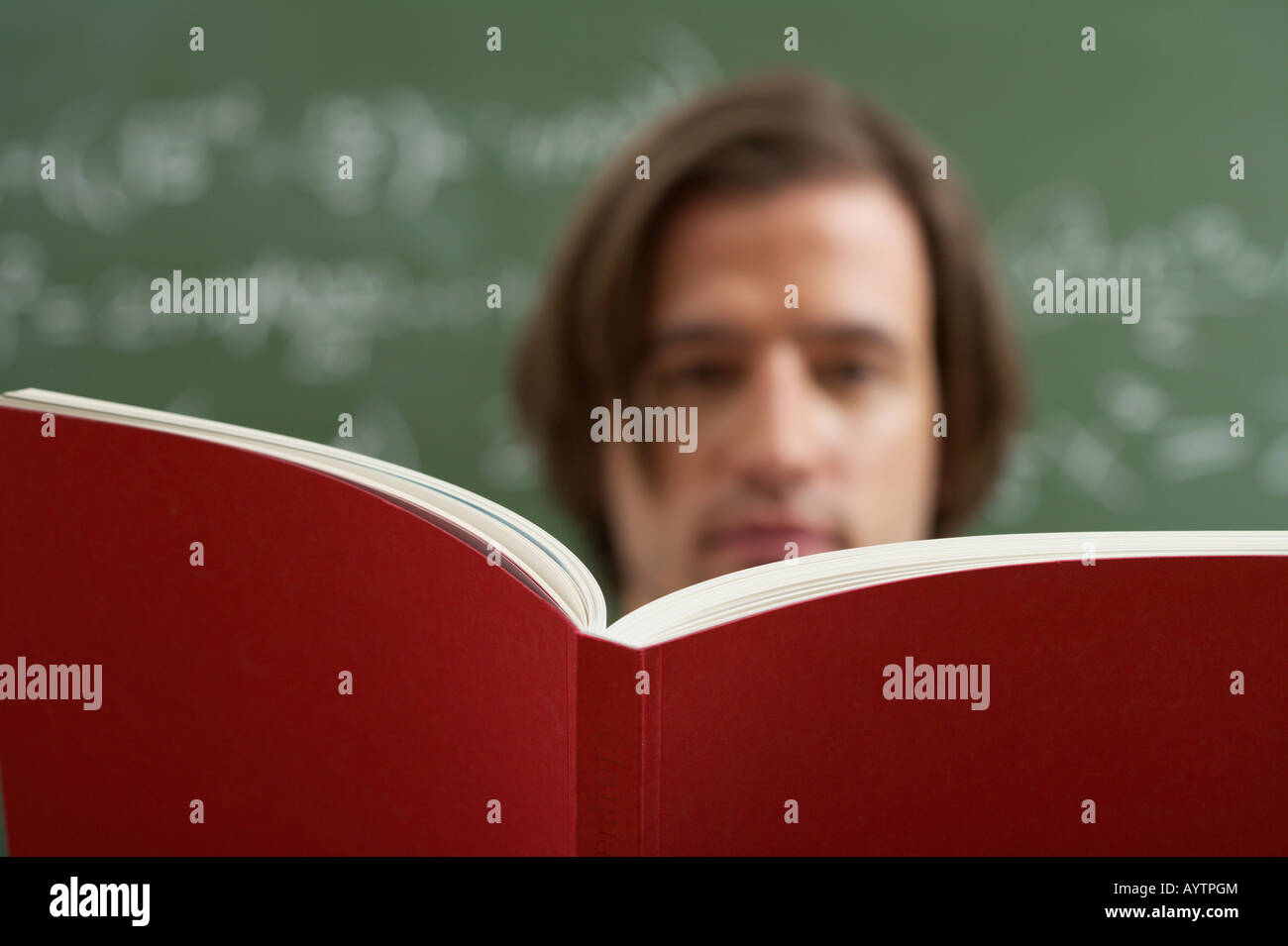 Learning young man book hi-res stock photography and images - Alamy