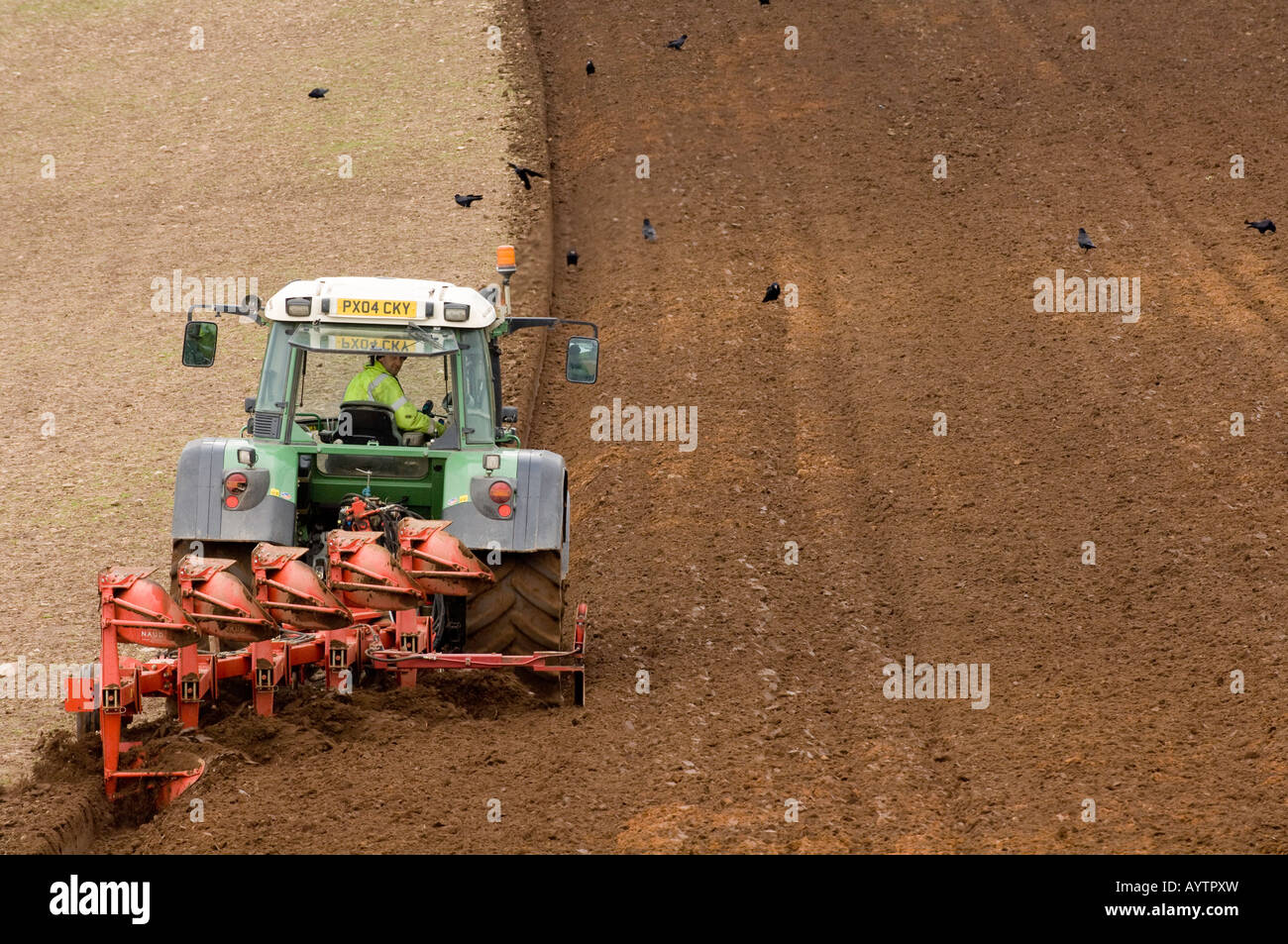 Tractor Ploughing Stock Photos & Tractor Ploughing Stock Images - Alamy