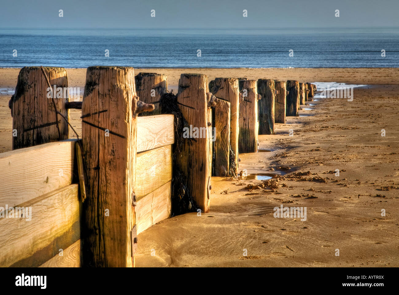 Wooden breakwater at Alnmouth Stock Photo - Alamy