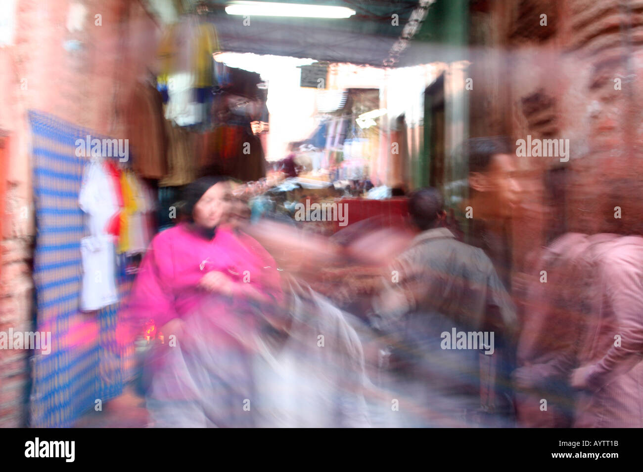 Busy alley behind a donkey and cart traffic jam in the souk, Marrakech ...