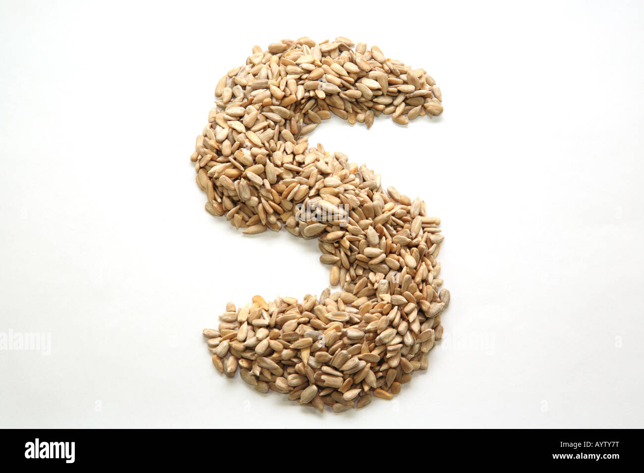 The shape of letter S made up from sunflower seeds Stock Photo - Alamy