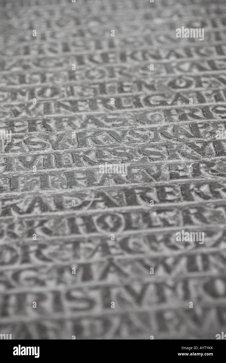 latin inscription on old stone floor Stock Photo - Alamy