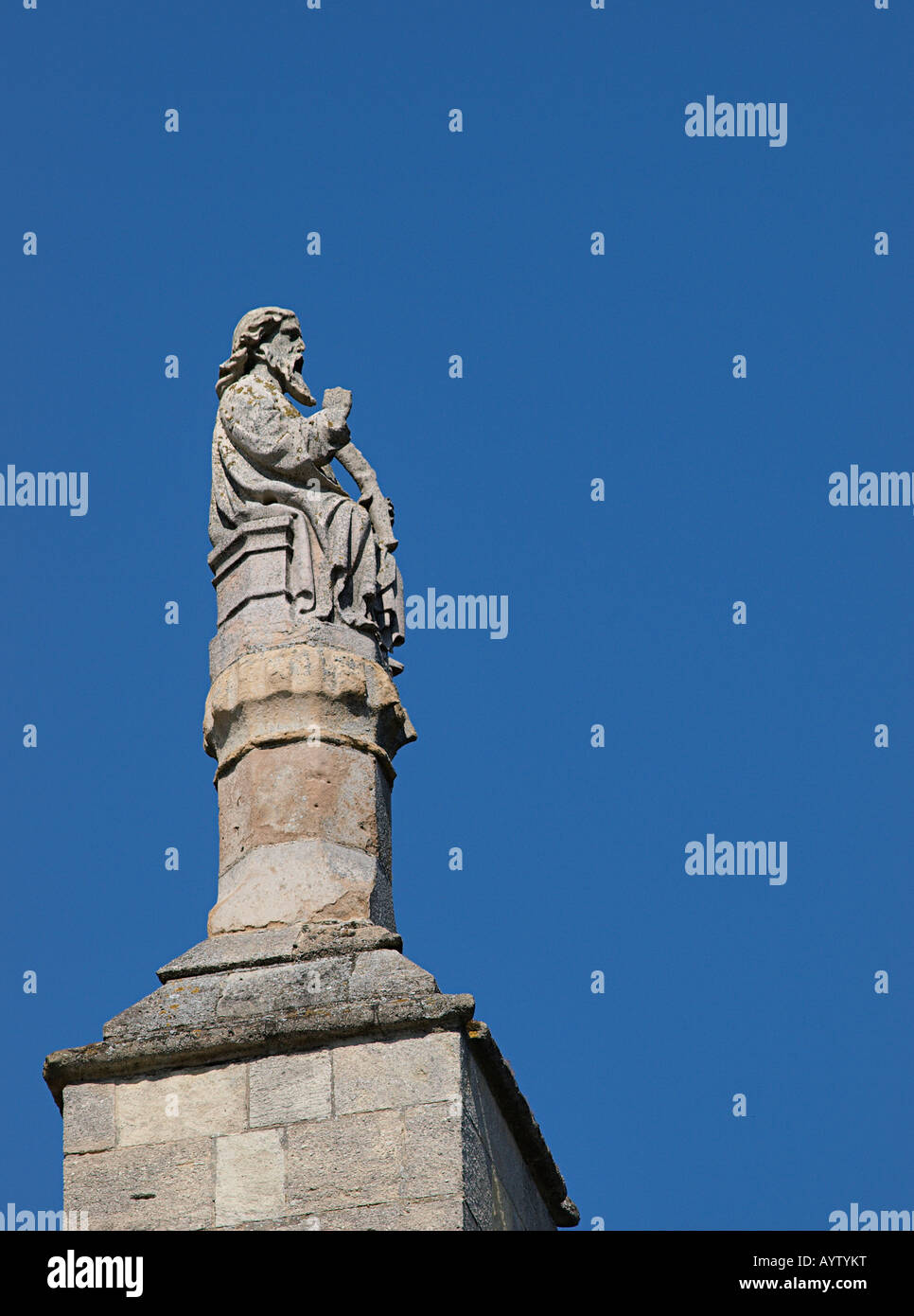STONE STATUE ATOP BASE OF FLYING BUTTRESS NORWICH CATHEDRAL NORFOLK ...