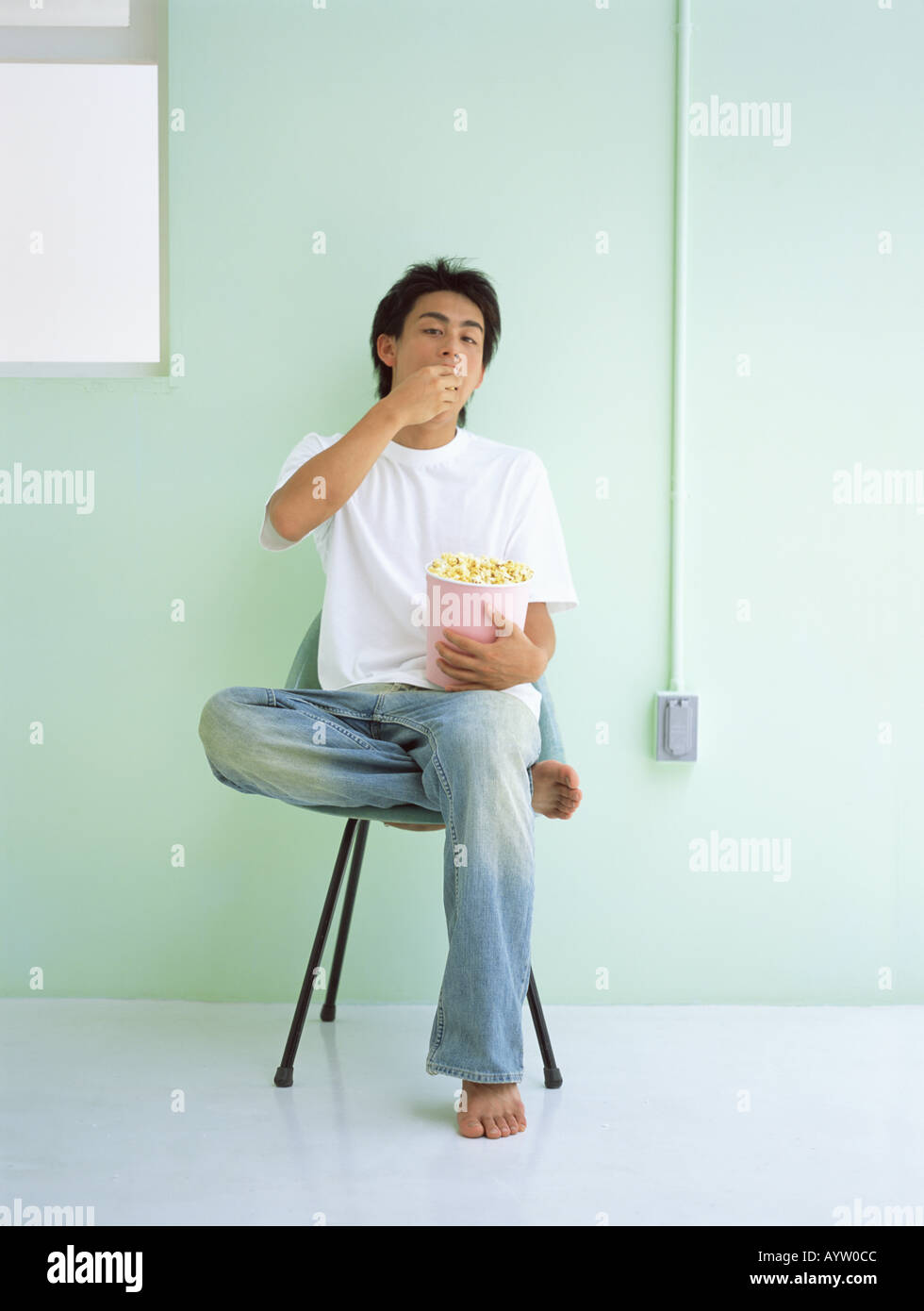 Man on a chair hi-res stock photography and images - Alamy