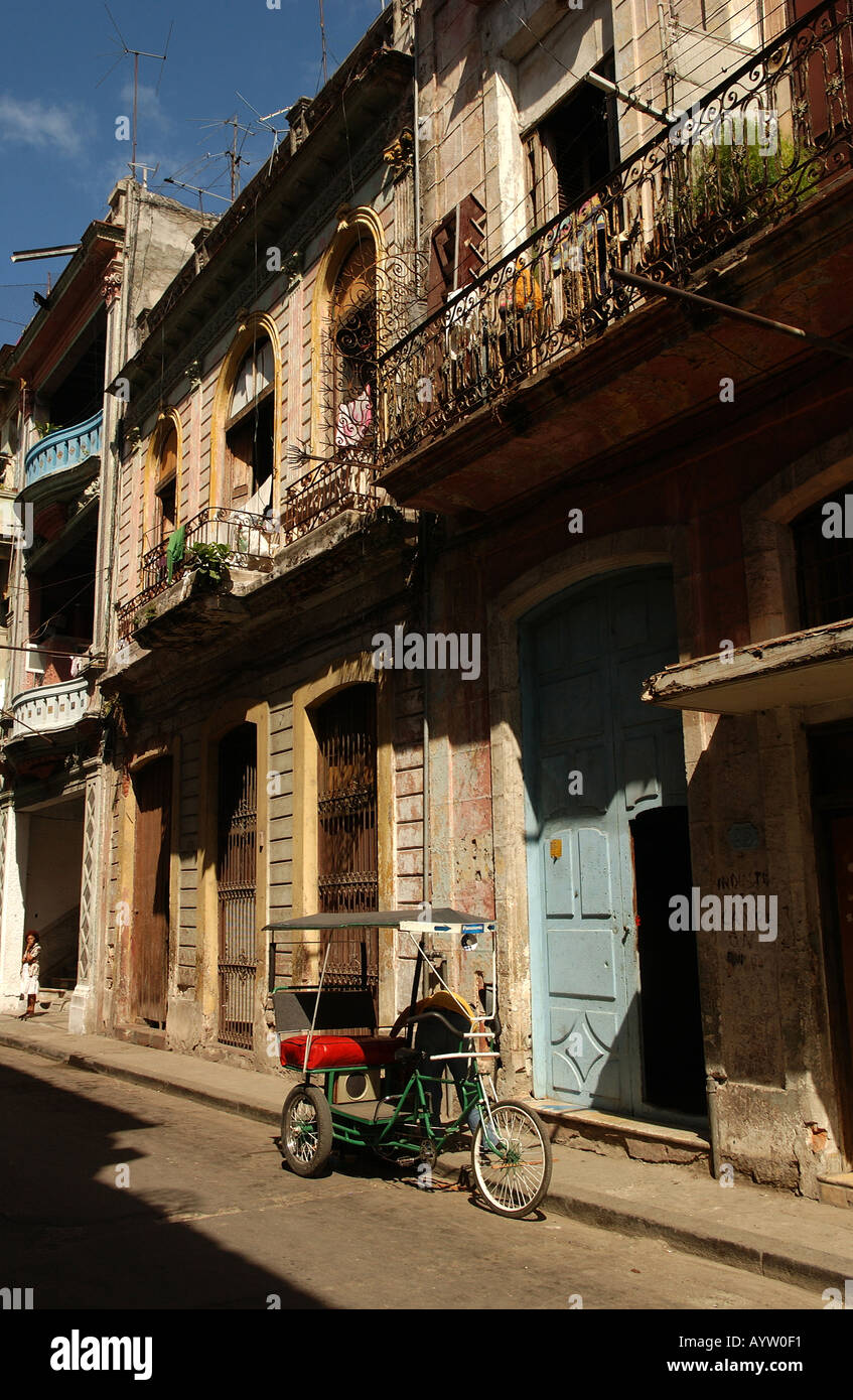 Pedicab parked outside a building Havana Cuba Stock Photo - Alamy