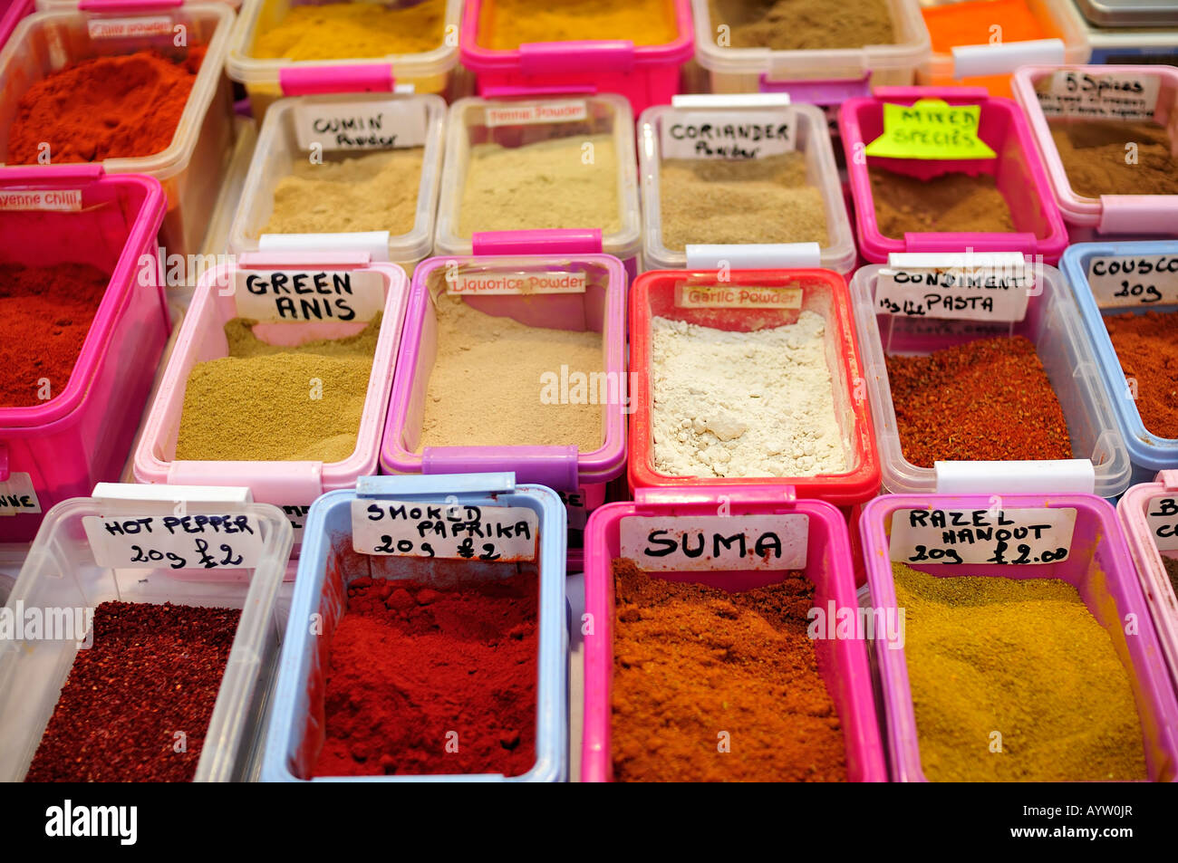 Selection of spices at indoor farmers market Stock Photo - Alamy
