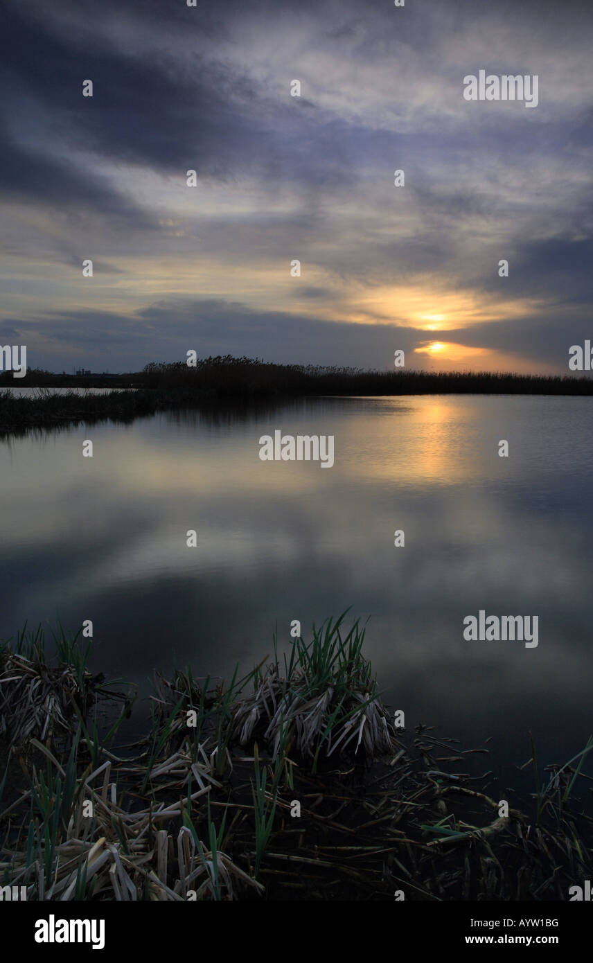 A heavy sunset over the lake Stock Photo - Alamy