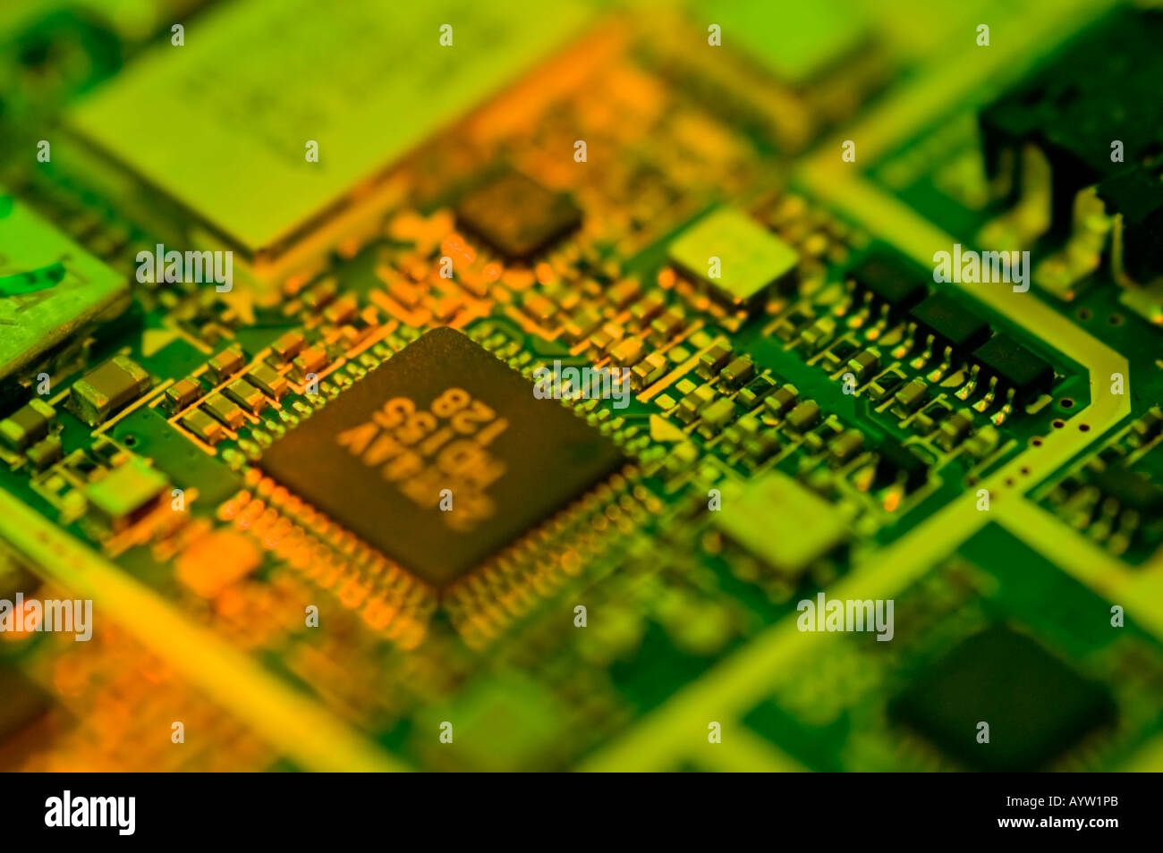 Interior circuitry of a mobile phone under green cast light Stock Photo ...