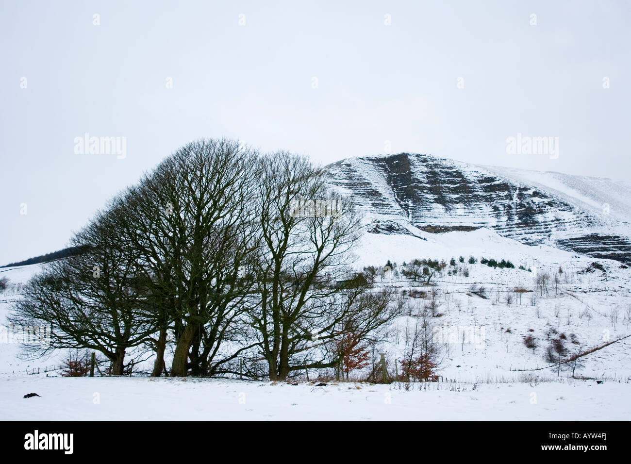 View of a Snow Covered Mam Tor in winter above Castleton in the Peak ...