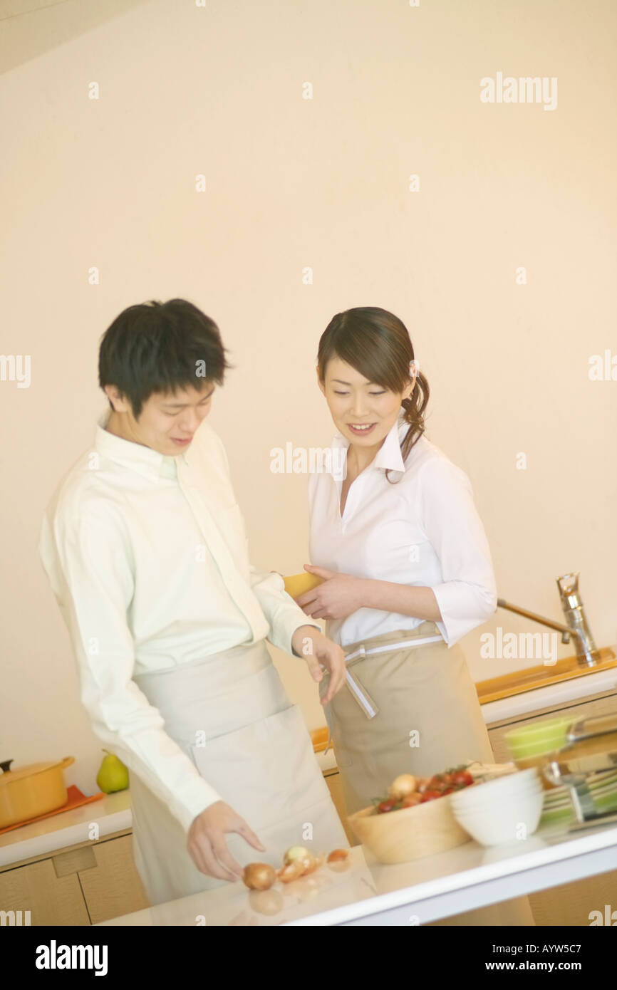 Couple in the kitchen Stock Photo - Alamy