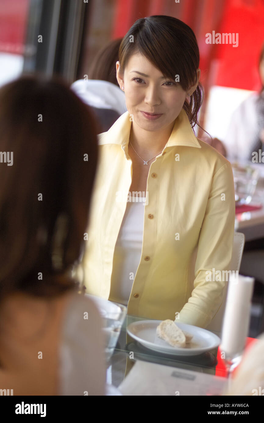 Women taking lunch at a restaurant Stock Photo - Alamy
