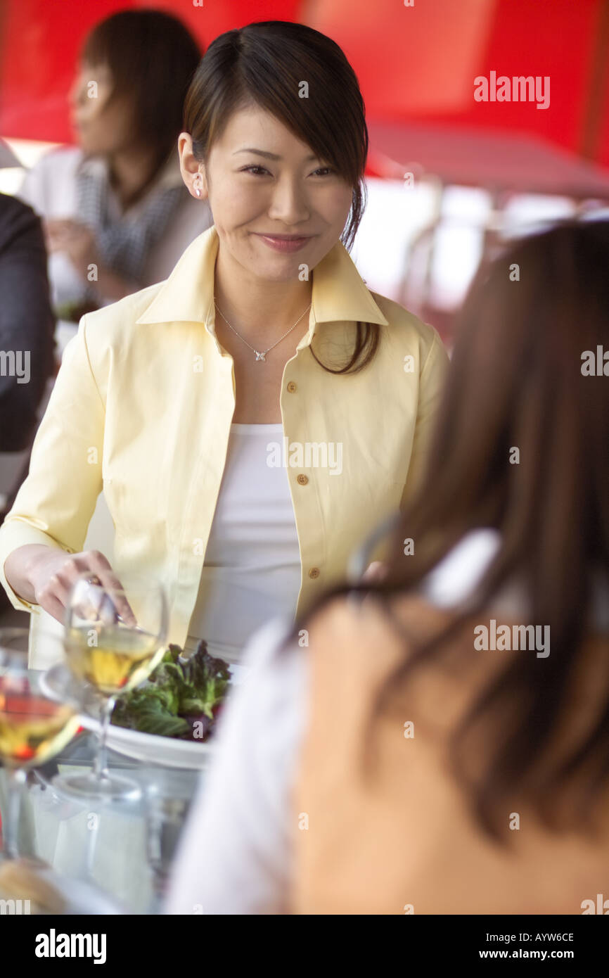 Women taking lunch at a restaurant Stock Photo - Alamy