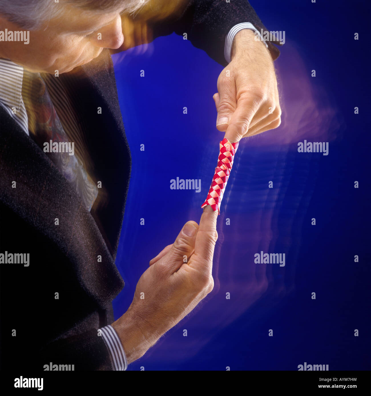 Hands tied red tape hi-res stock photography and images - Alamy