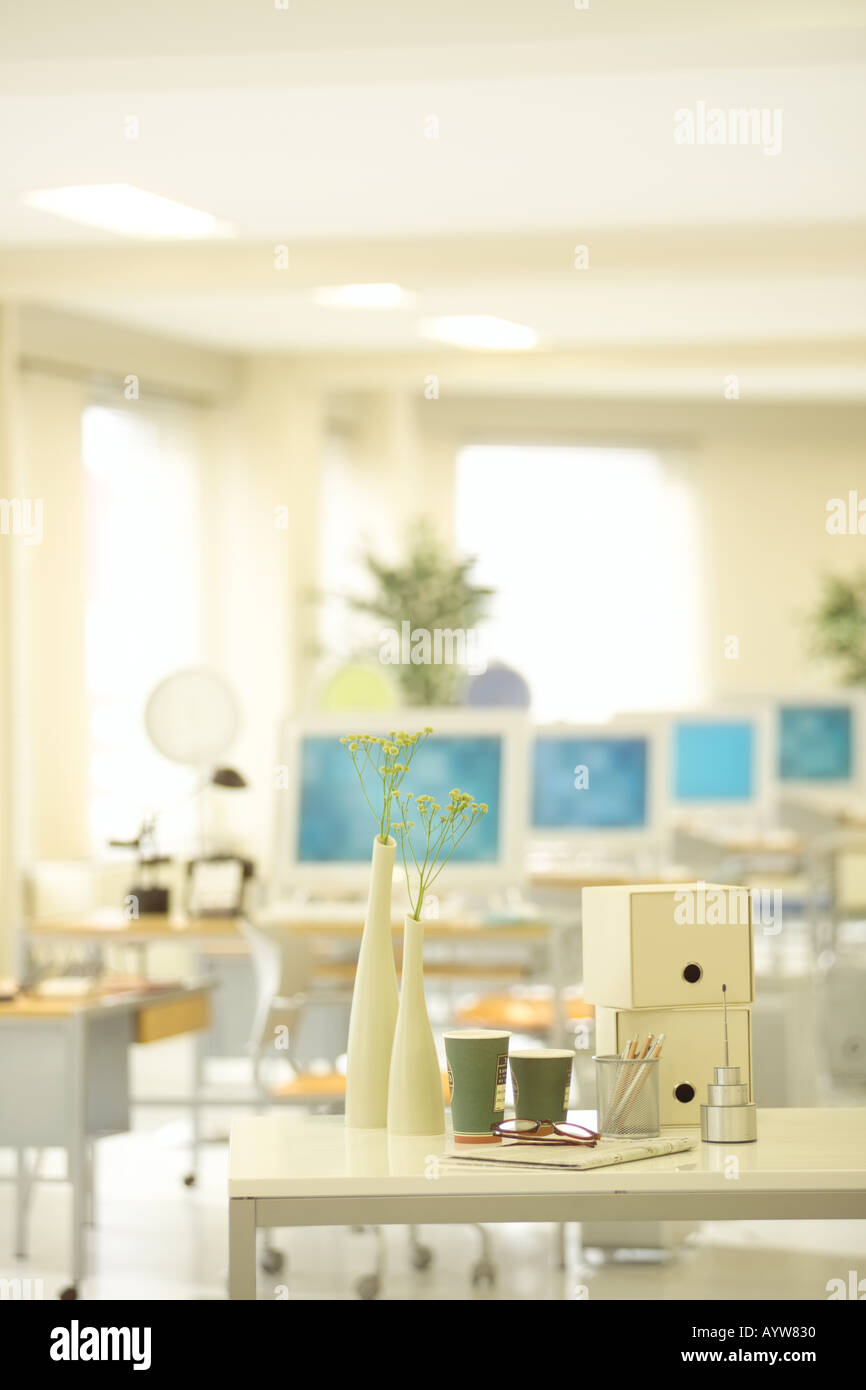 Office interior with flowers in white vases Stock Photo - Alamy