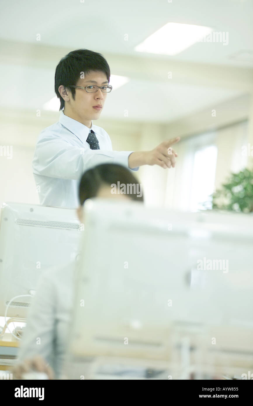 Business man with computer Stock Photo - Alamy