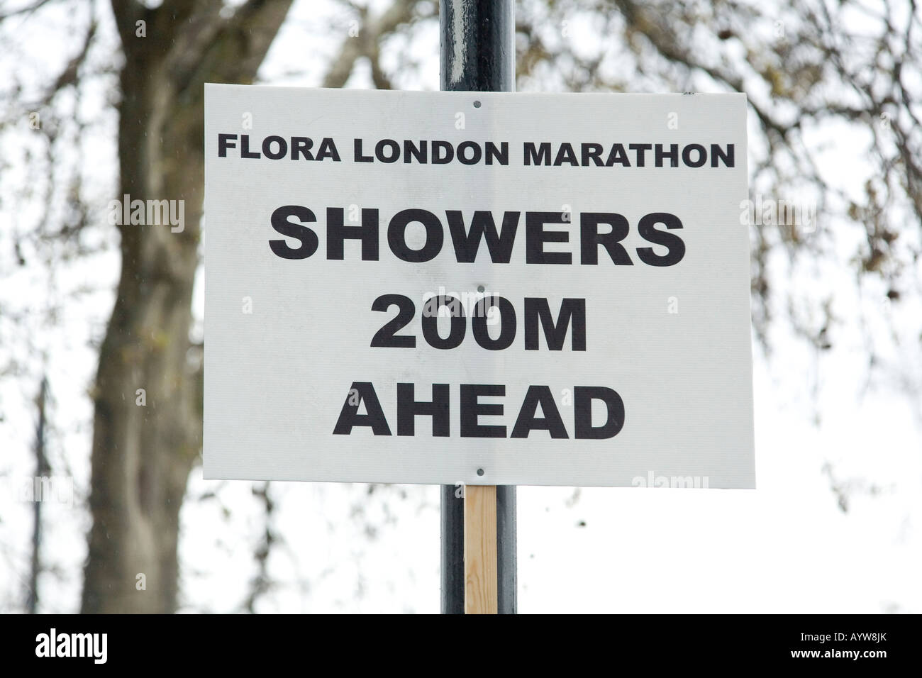 A London Marathon sign for showers at the 17 mile stage of the London ...