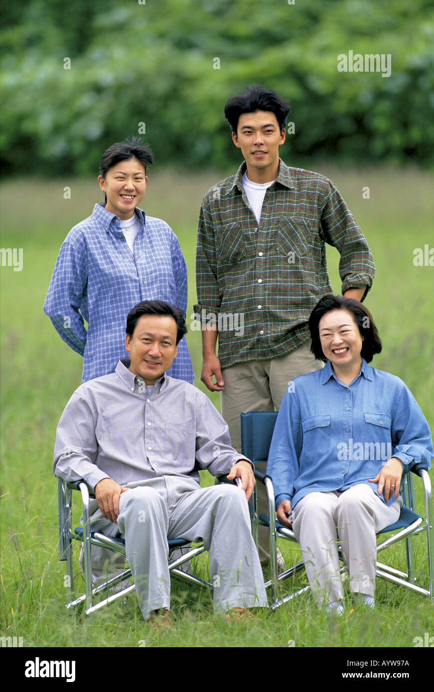Young couple with their parents Stock Photo - Alamy