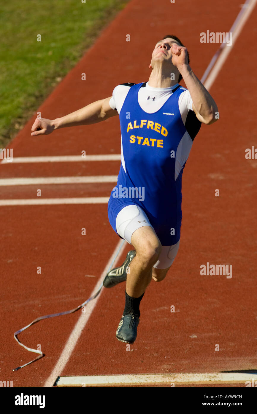 Athlete performs long jump Stock Photo - Alamy