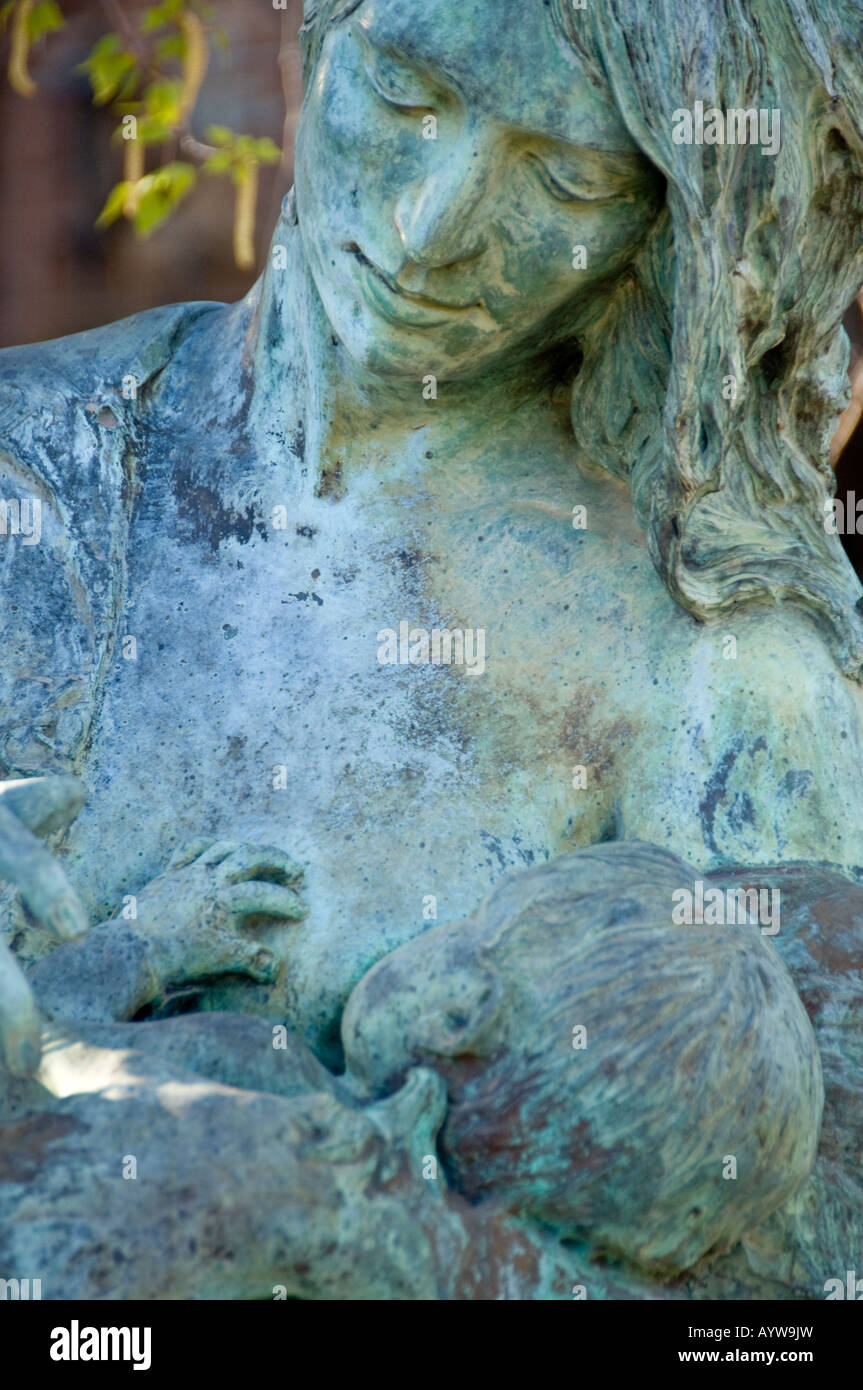 Statue of Mother Nursing a Baby Stock Photo - Alamy