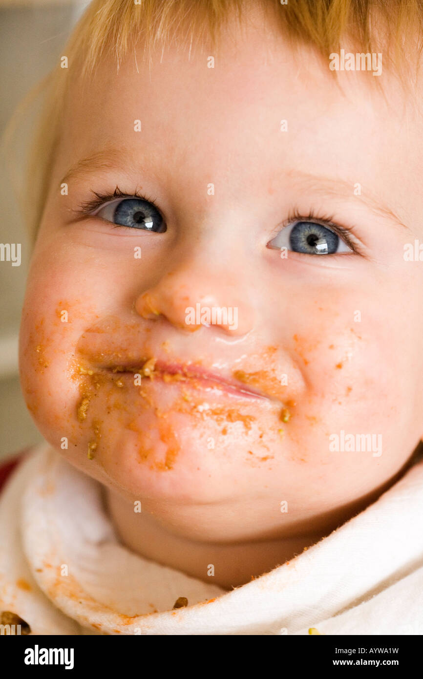 Portrait of toddler eating Stock Photo - Alamy