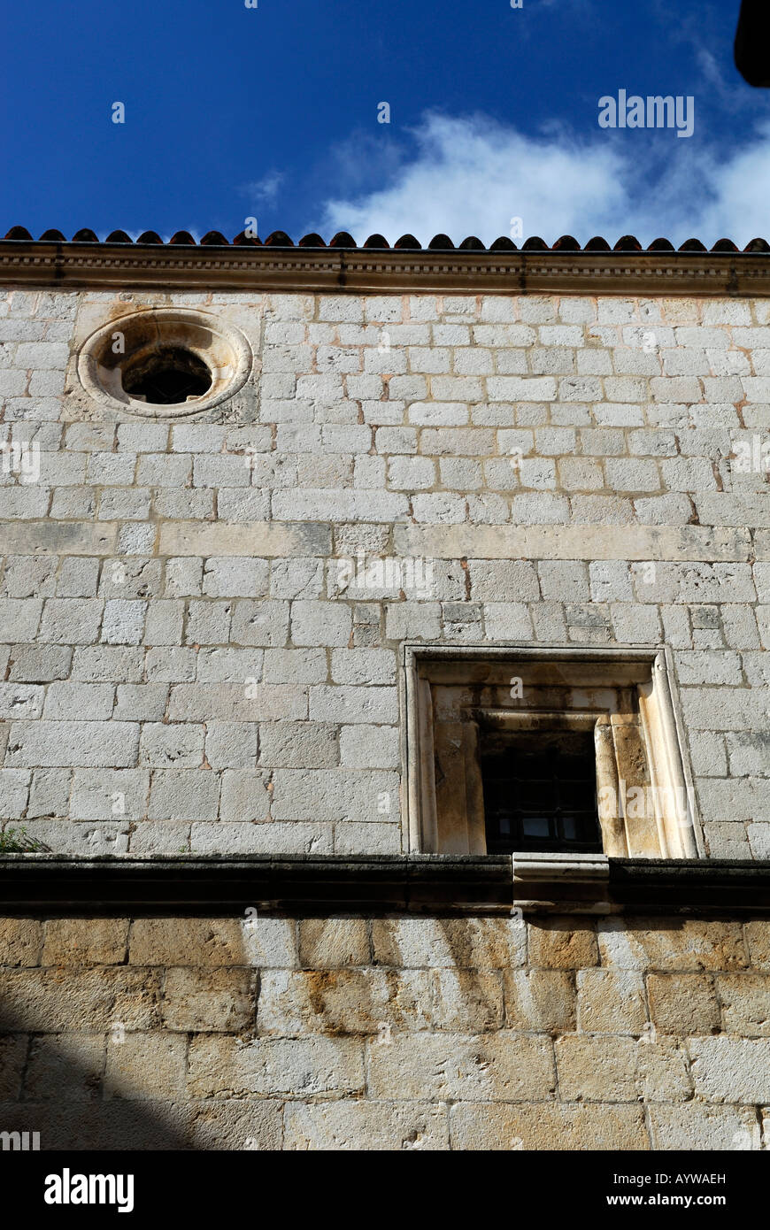 Carved windows in stone wall Sponza Palace Dubrovnik old town Croatia ...