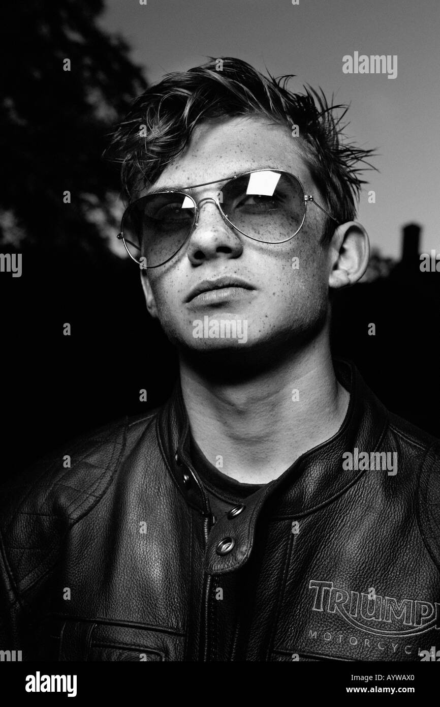 Black and white photograph of a rockerbilly posing with sunglasses ...