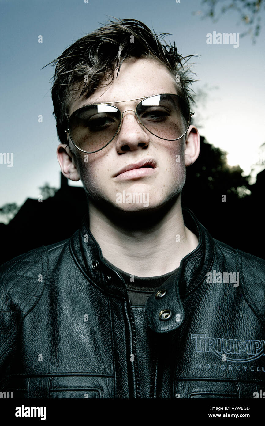 Rockerbilly posing in sunglasses Stock Photo - Alamy