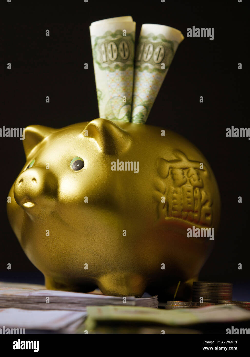 Two paper note in a piggy bank Stock Photo - Alamy