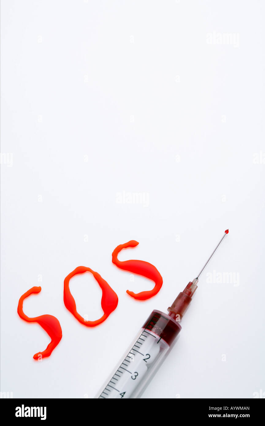 Red written word SOS and a syringe Stock Photo - Alamy