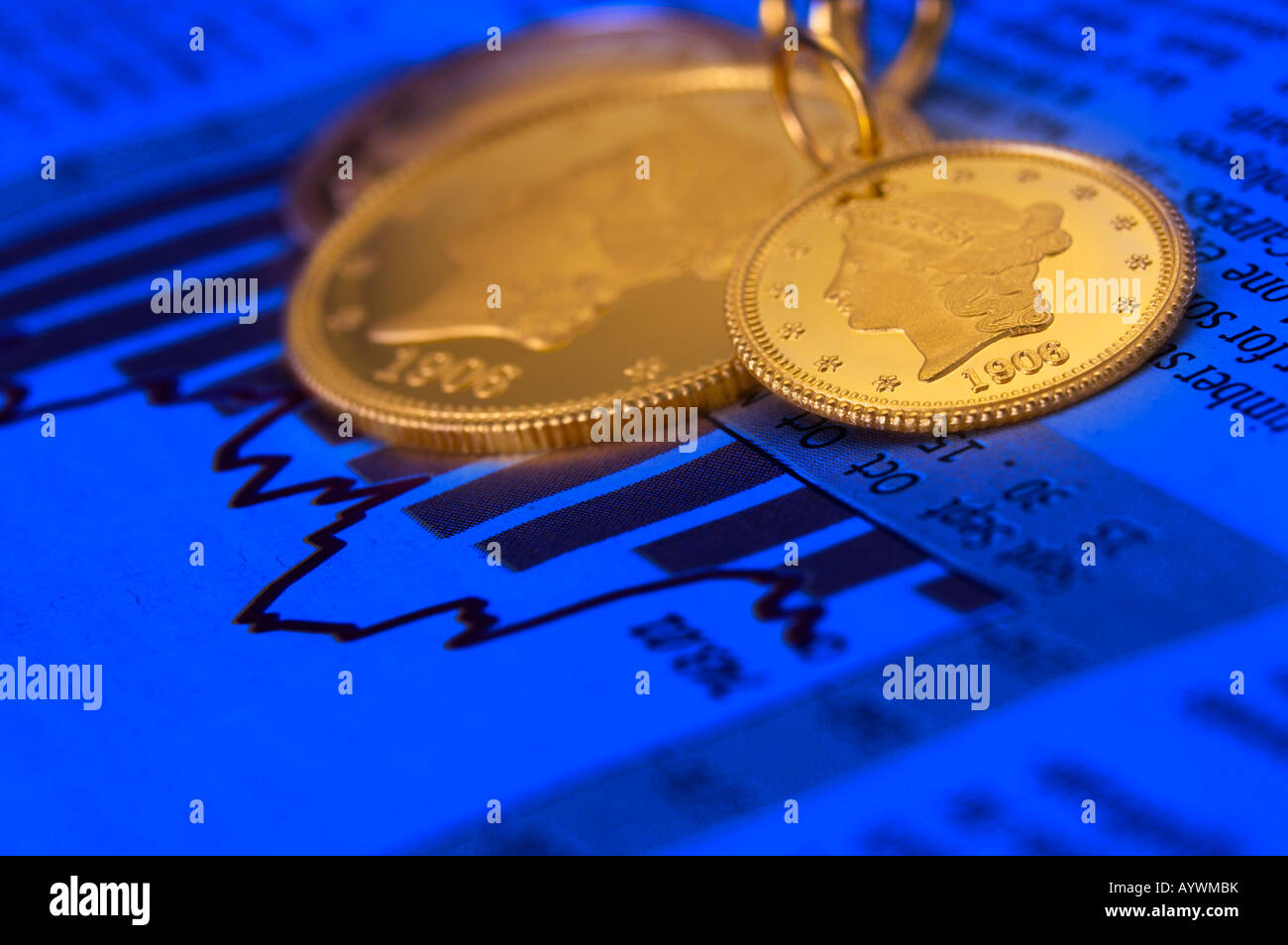 Gold coins on graphical chart with blue background Stock Photo - Alamy