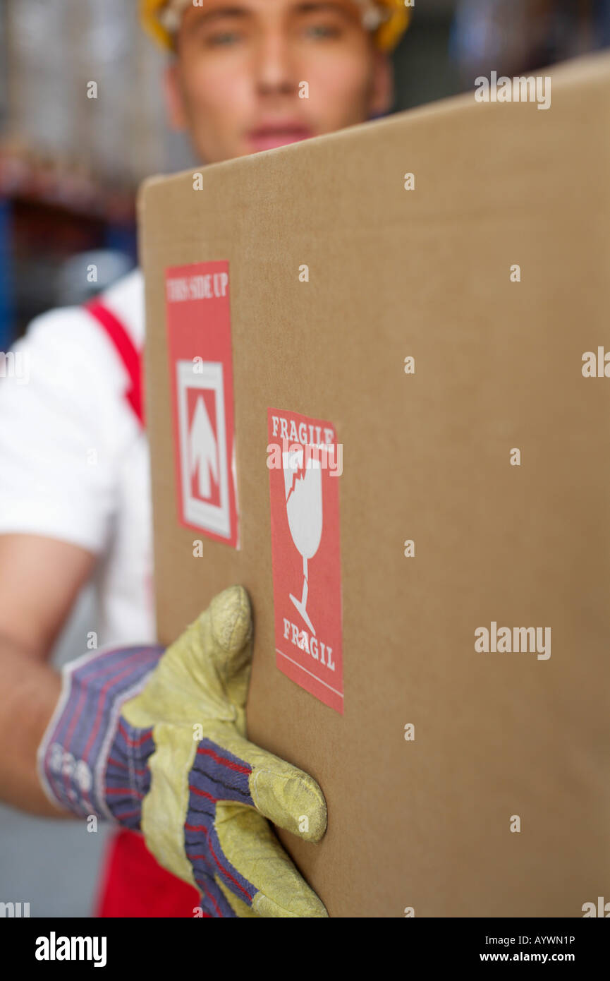 Man carrying packet hi-res stock photography and images - Alamy
