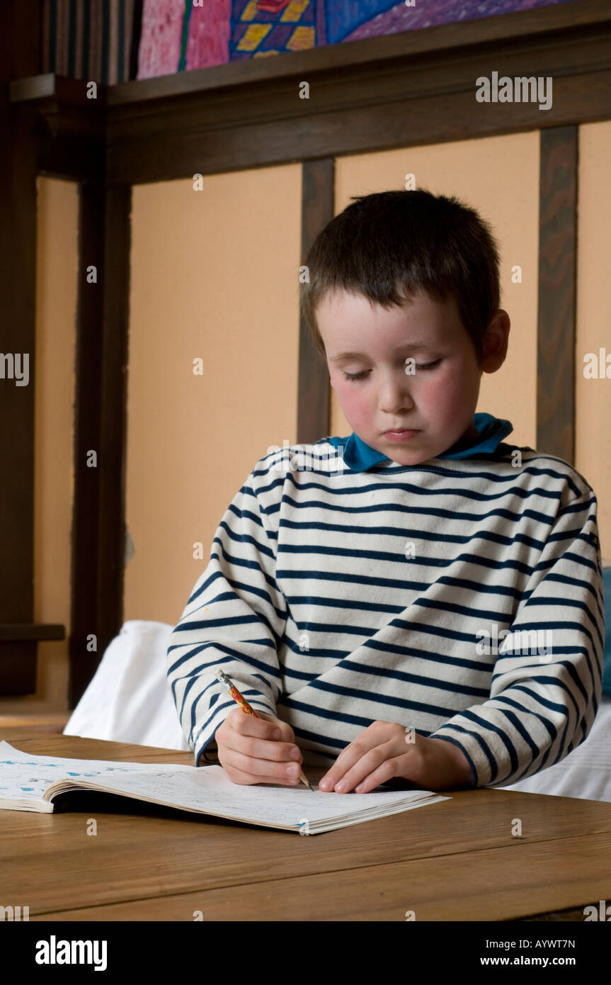 boy doing home work Stock Photo - Alamy