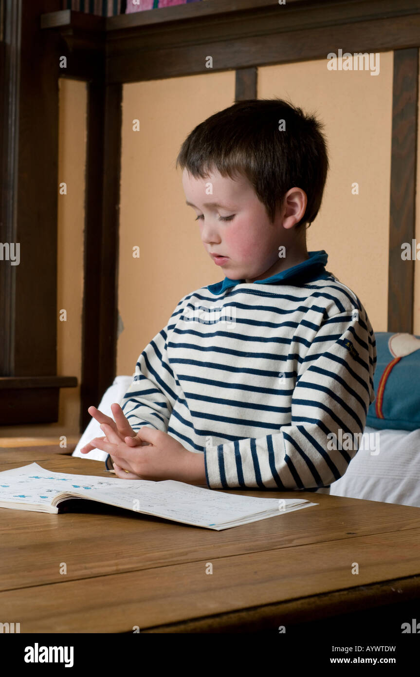 boy doing home work Stock Photo - Alamy