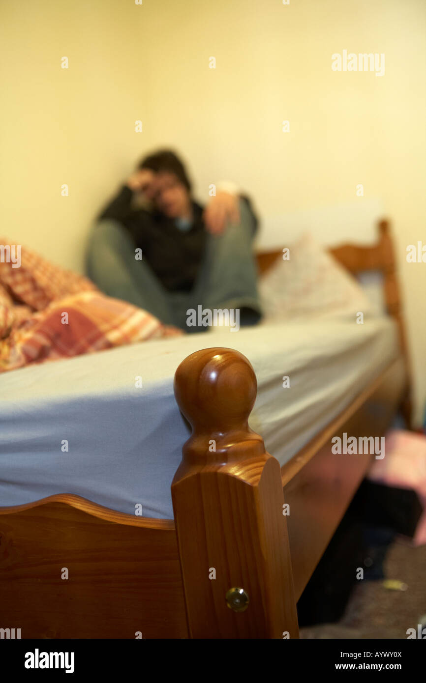 Man curled up sad hi-res stock photography and images - Alamy