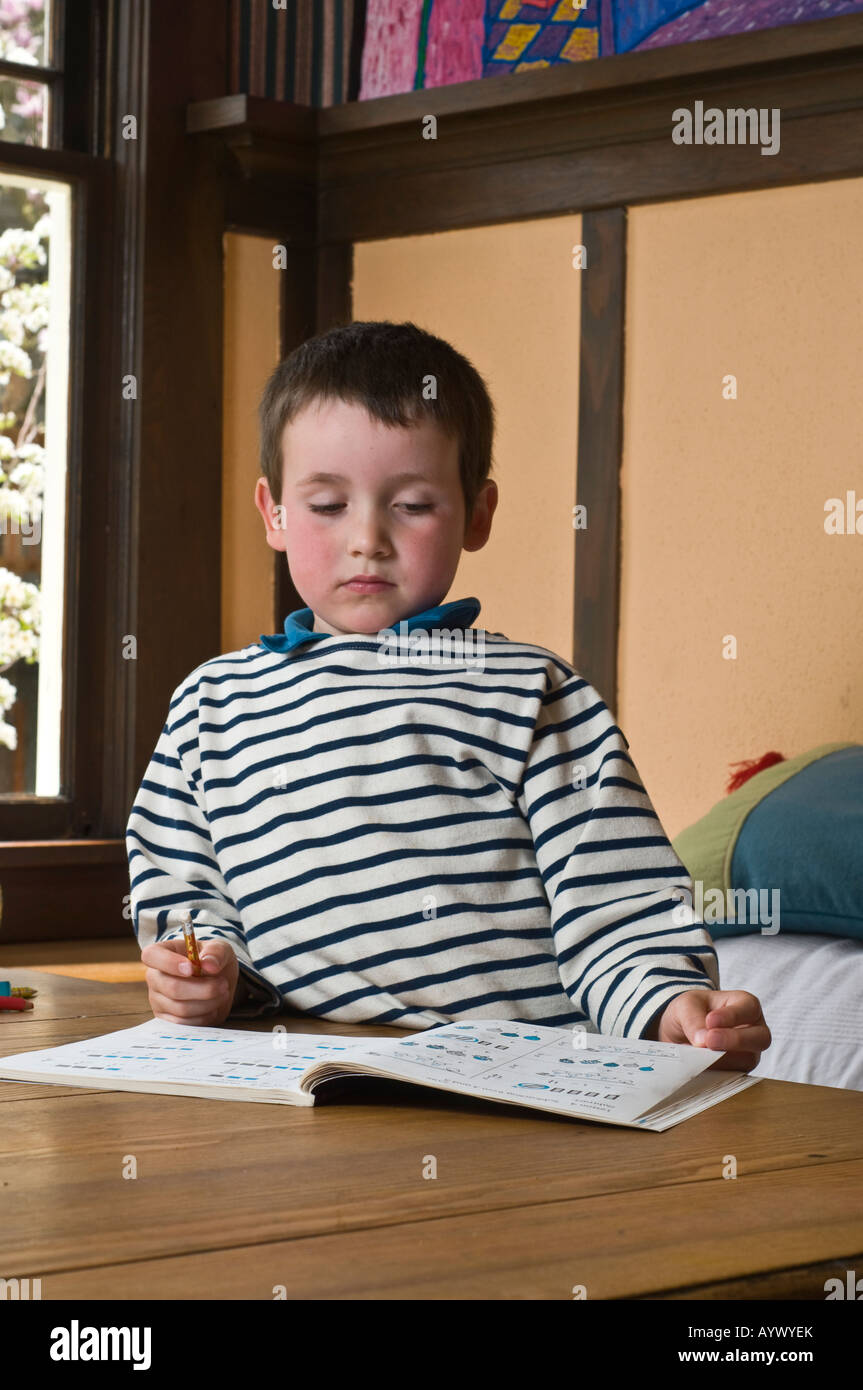 boy doing home work Stock Photo - Alamy