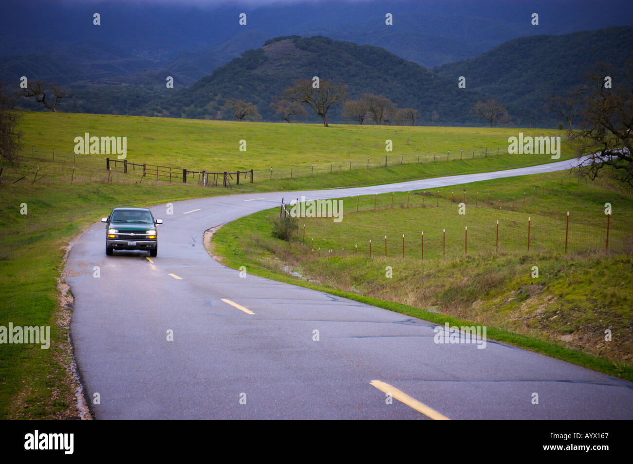 Pickup truck driving down road hi-res stock photography and images - Alamy