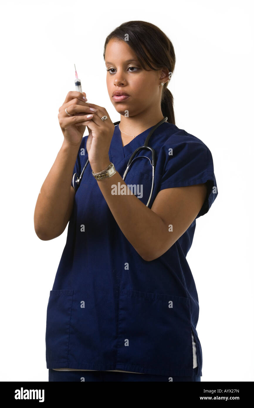 Nurse prepping syringe Stock Photo - Alamy