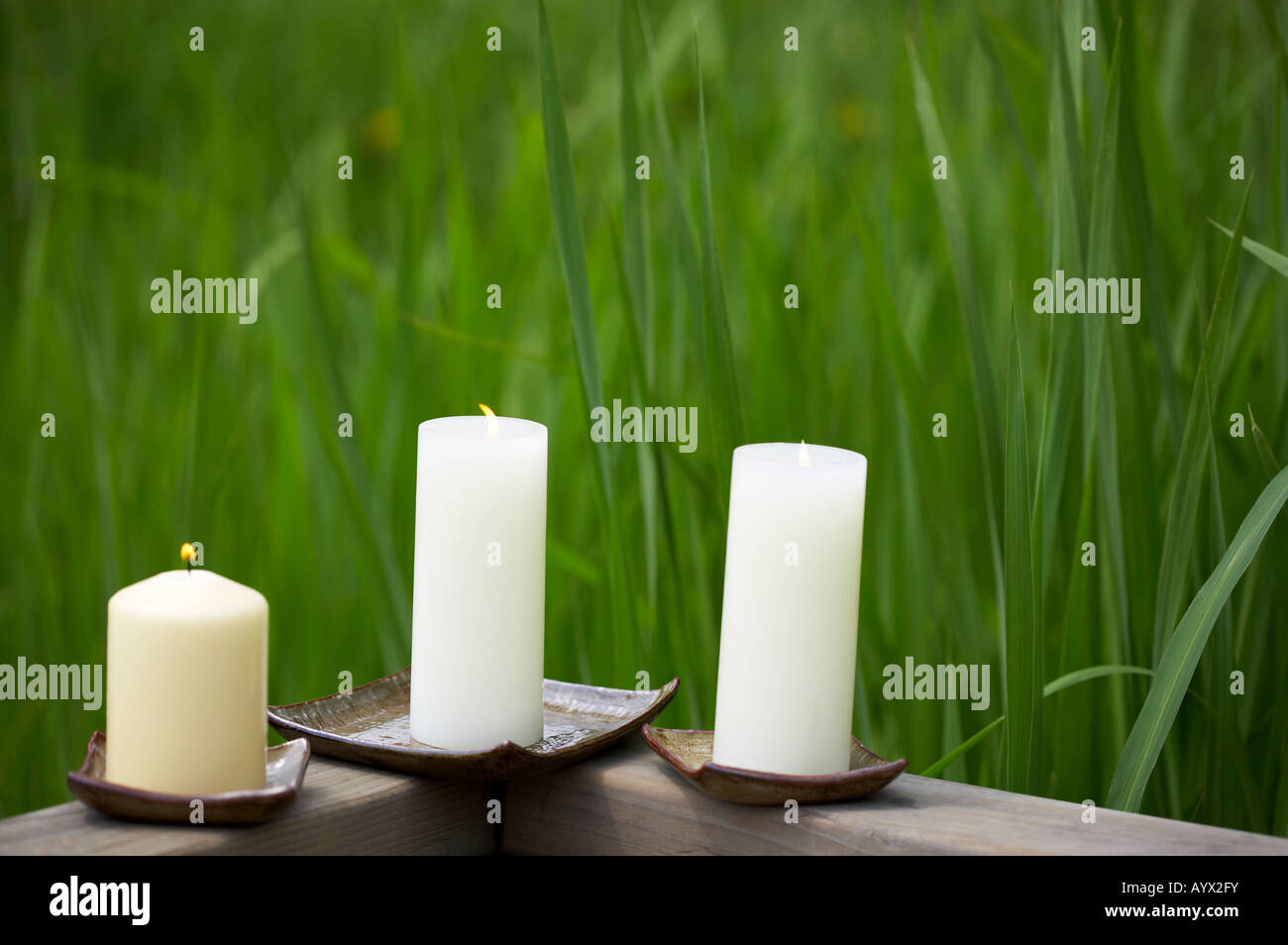 candles in the garden Stock Photo - Alamy