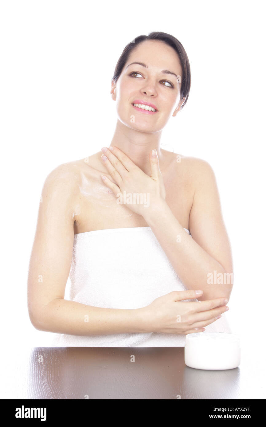 Young Woman Applying Body Cream Model Released Stock Photo - Alamy
