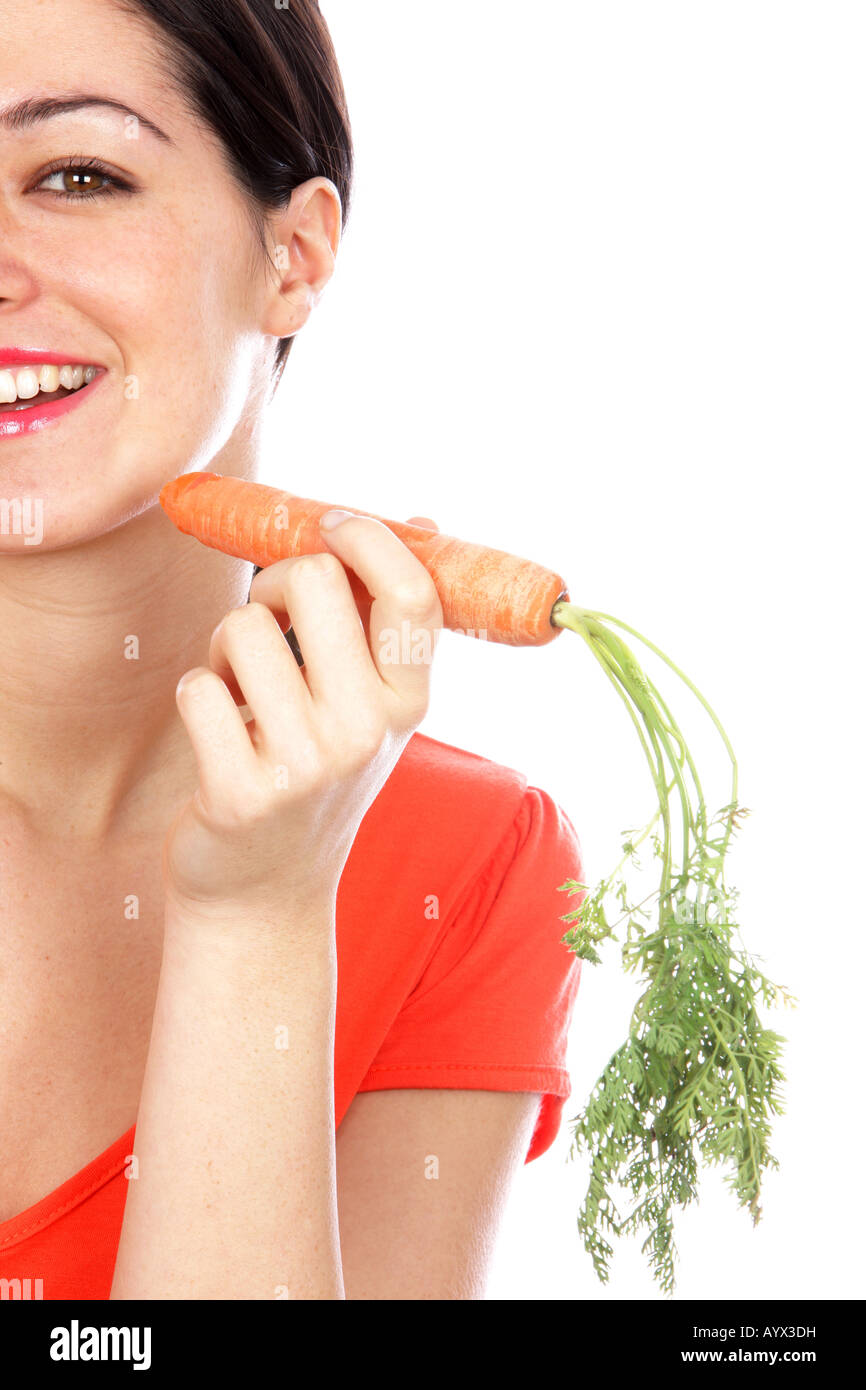 Young Woman Eating Carrot Model Released Stock Photo - Alamy