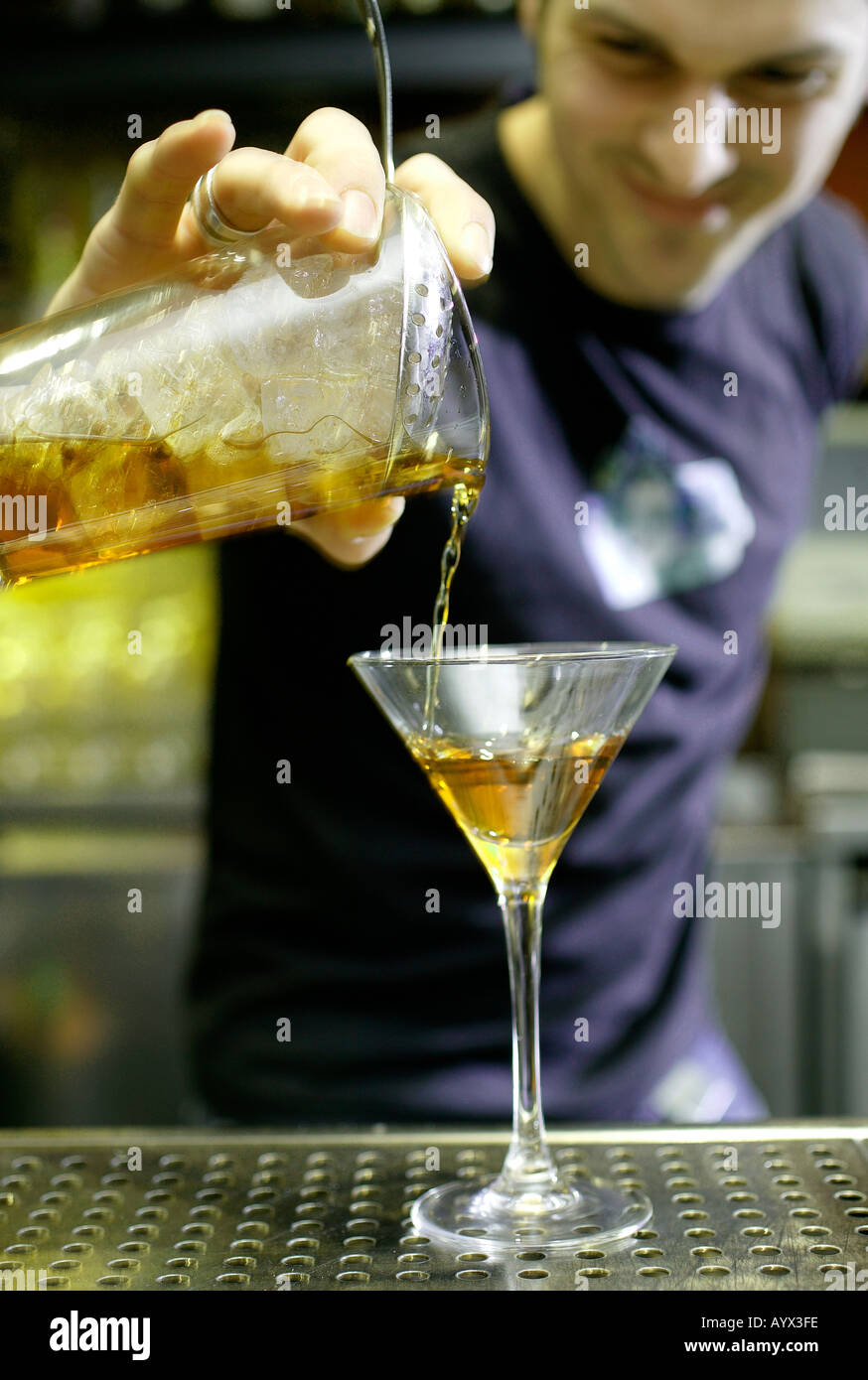 Bartender shaking a cocktail bar tender Stock Photo - Alamy