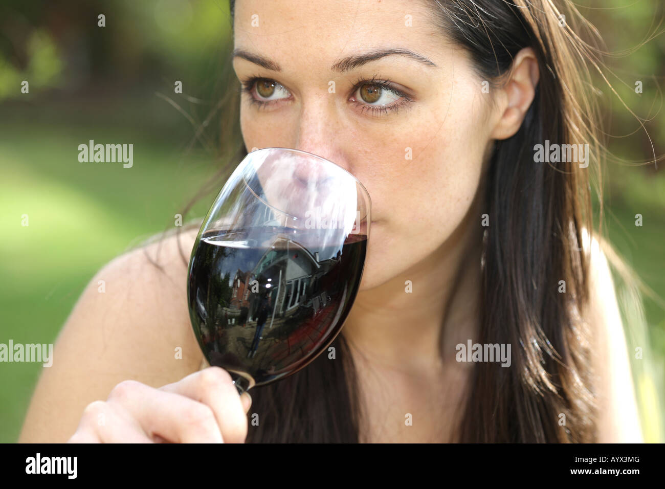 Young Woman Drinking Red Wine Model Released Stock Photo - Alamy