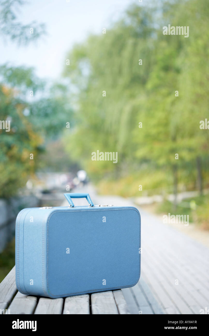 blue bag on the bench Stock Photo - Alamy