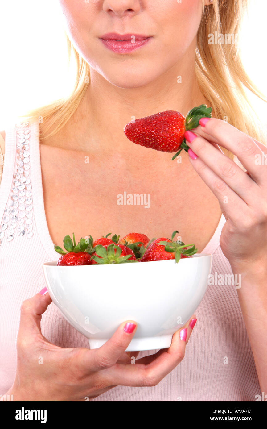Young Woman Eating Strawberries Model Released Stock Photo - Alamy