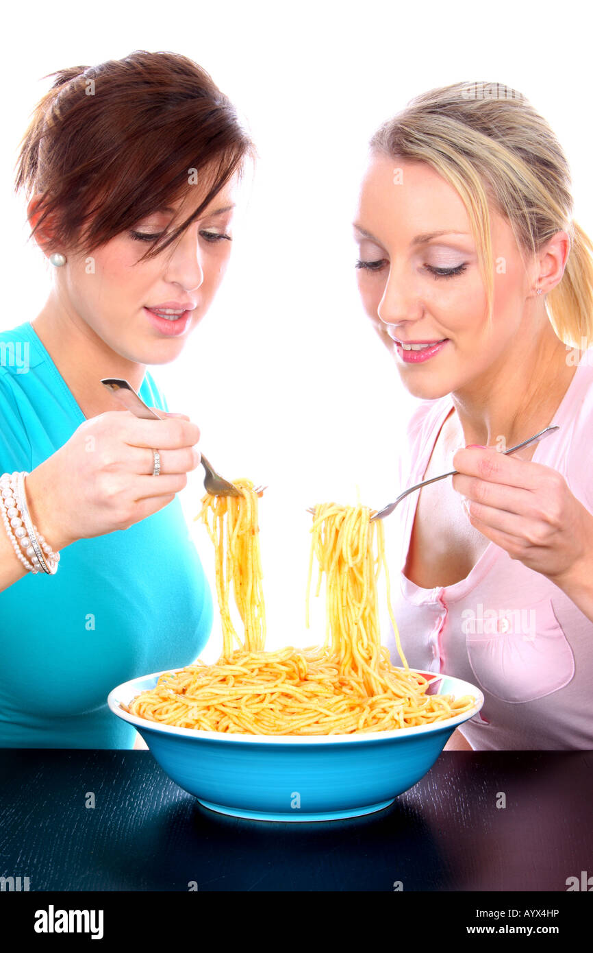Young Women Eating Spaghetti Model Released Stock Photo - Alamy