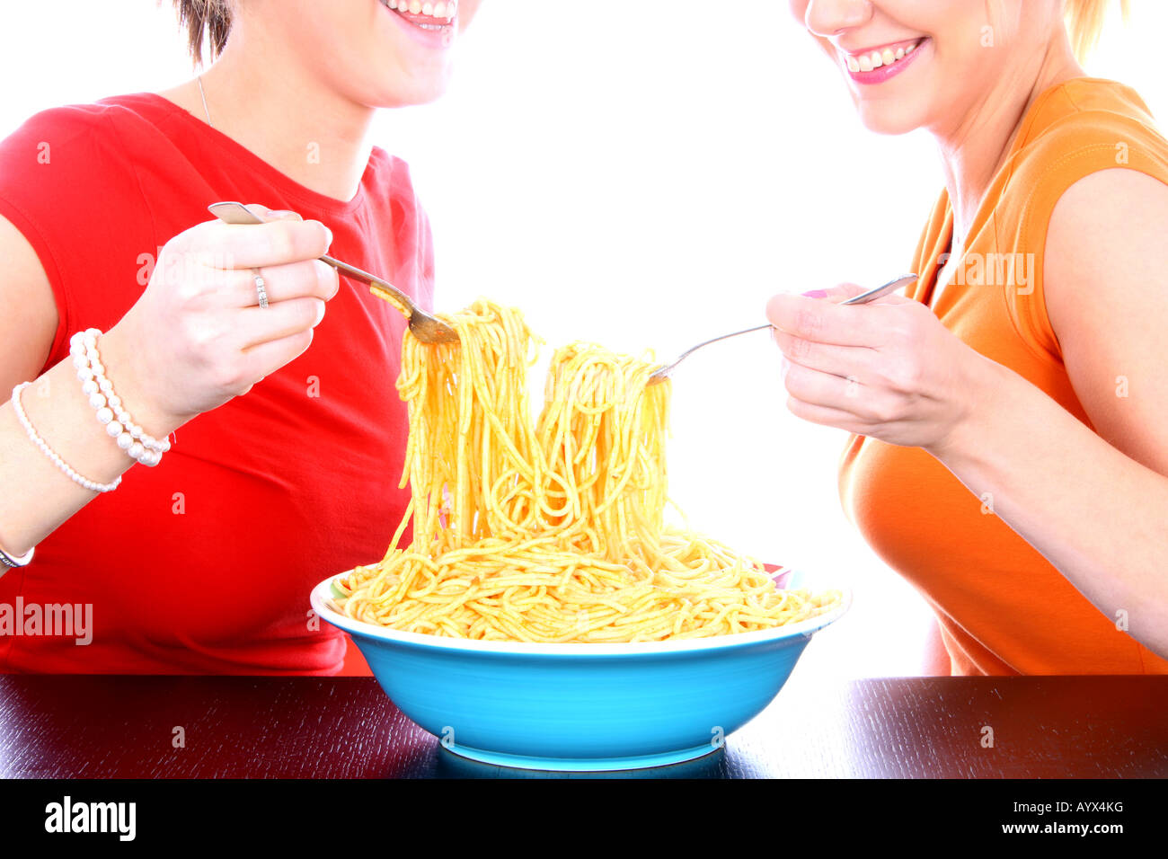 Young Women Eating Spaghetti Model Released Stock Photo - Alamy